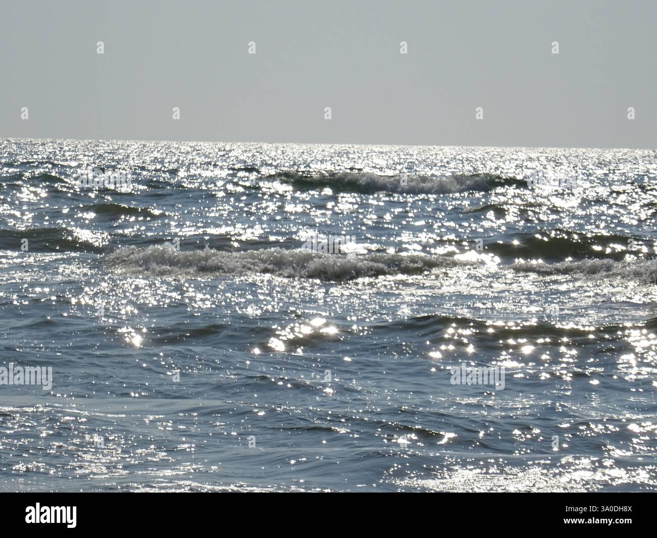 Sea and waves on a hot summer day Stock Photo - Alamy