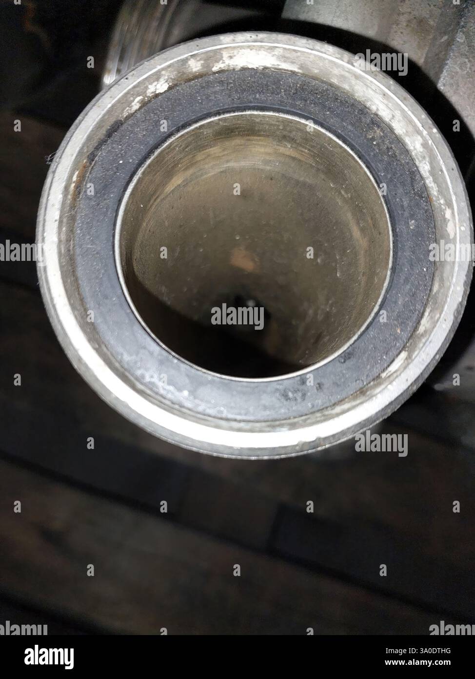 This stainless steel pipe fitting illustrates its detailed interior ...