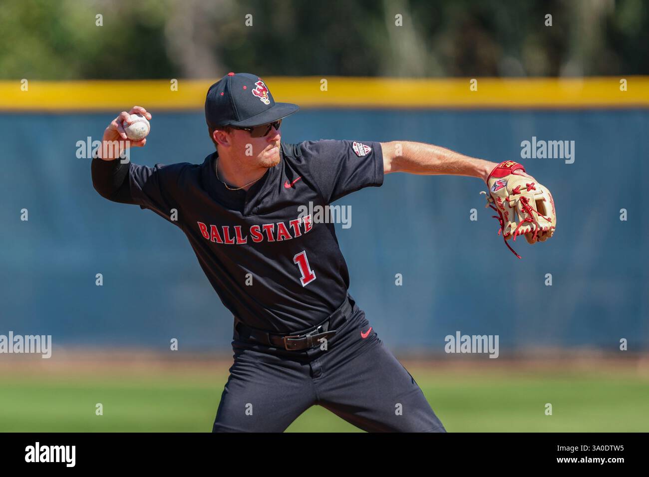 Ball State utility Grant Miller (1) warms up before an NCAA baseball ...