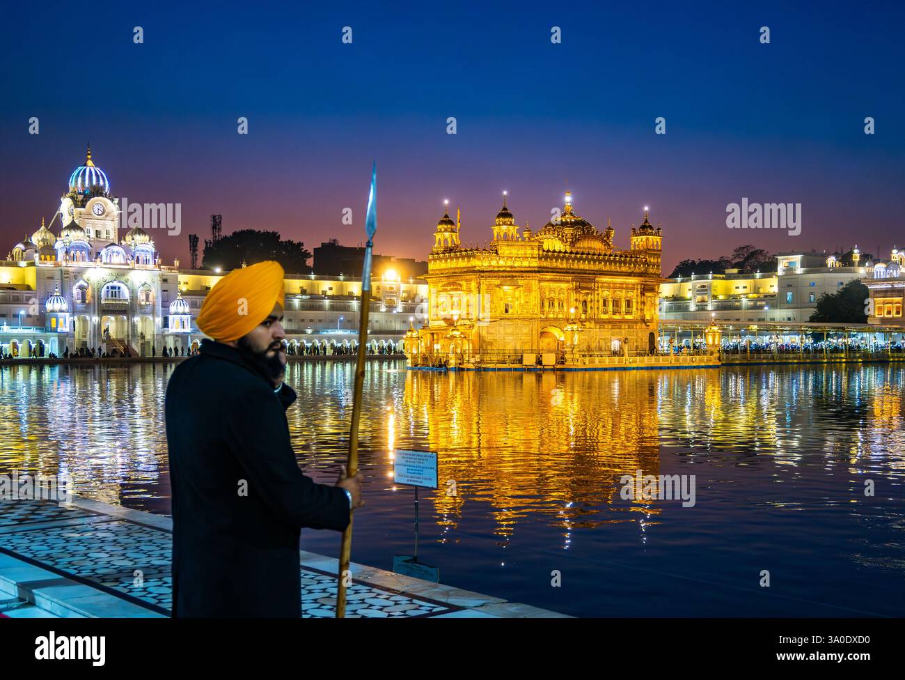 Sikh guard with a spear at the Golden Temple, or Harmandir Sāhib ...