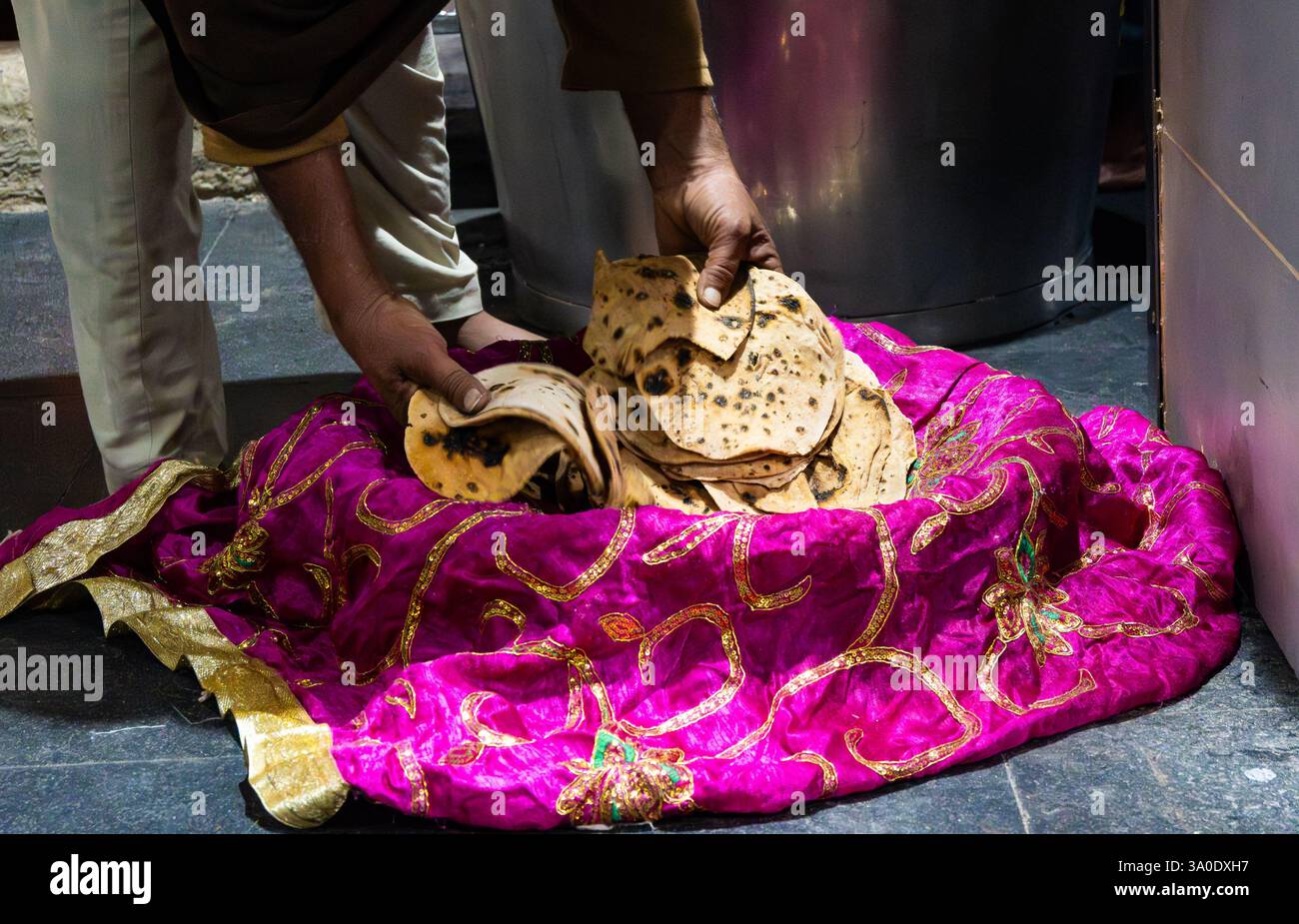 A stack of chapati in a basket at the langar, a Sikh community-run ...
