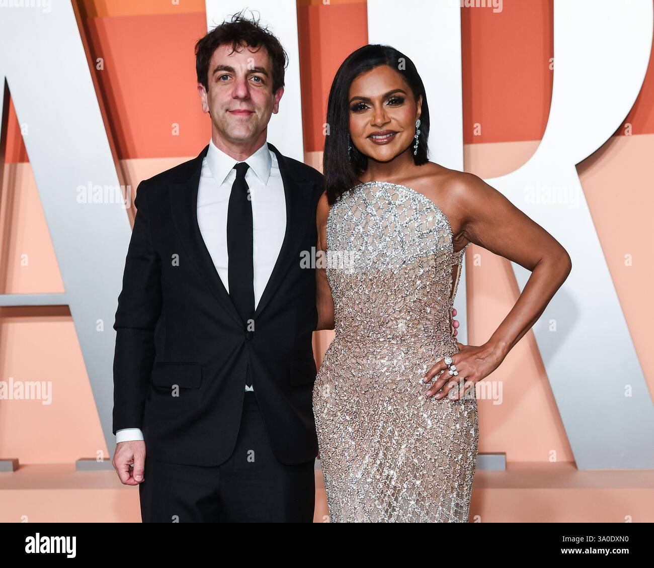 BJ Novak and Mindy Kaling walking on the red carpet at the 2025 Vanity ...