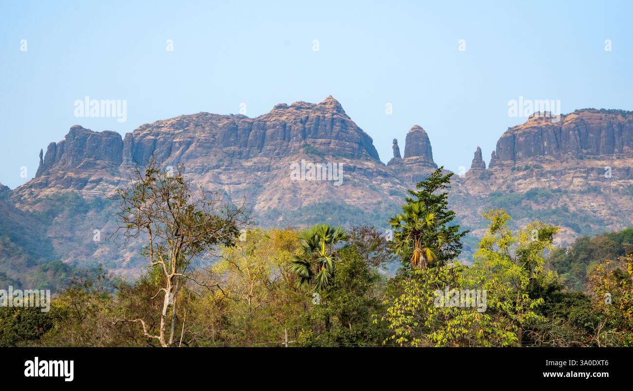 The mountain ridgeline shaped by thick layers of basalt lava flow of ...