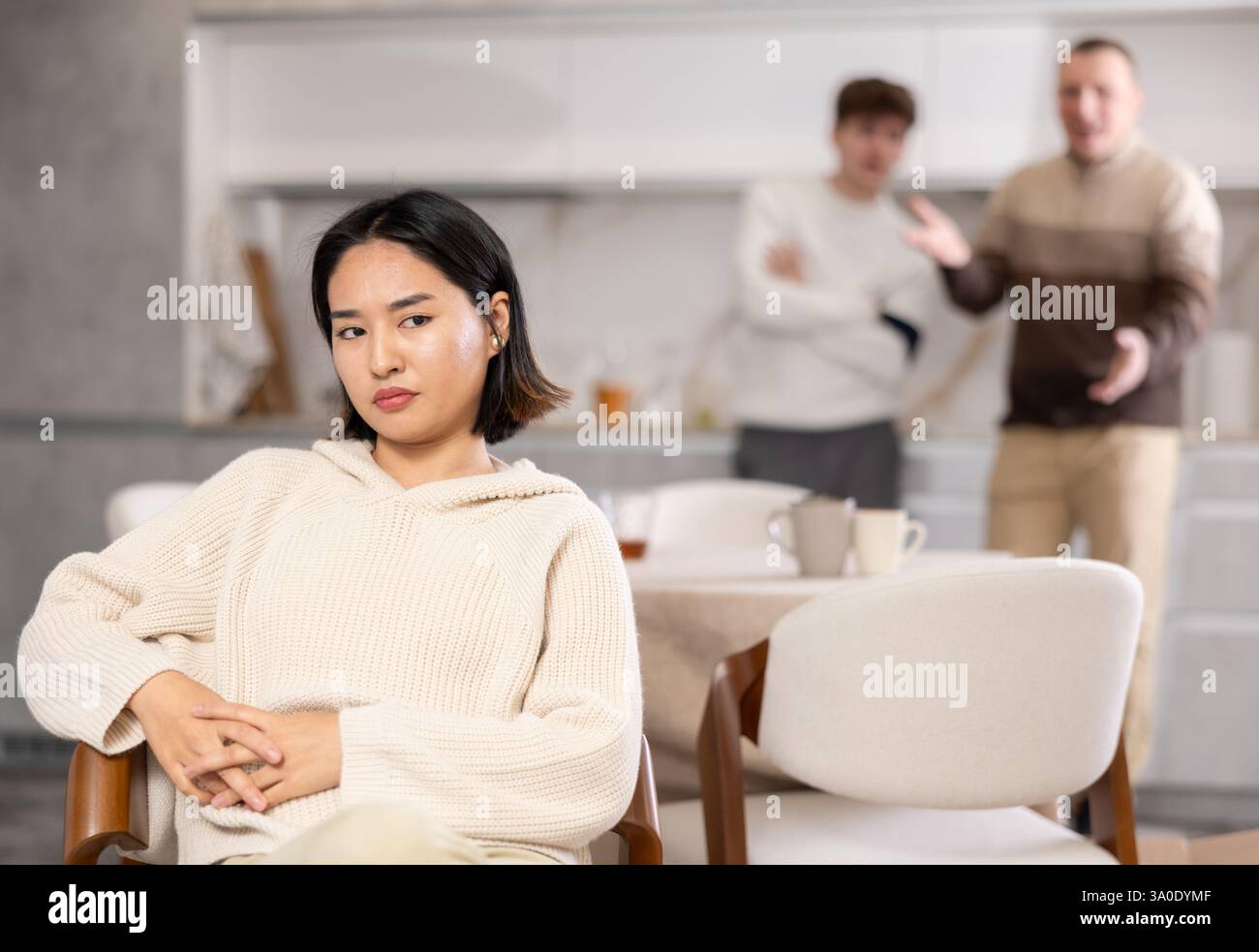 Upset woman not talking after disagreement with father and husband ...