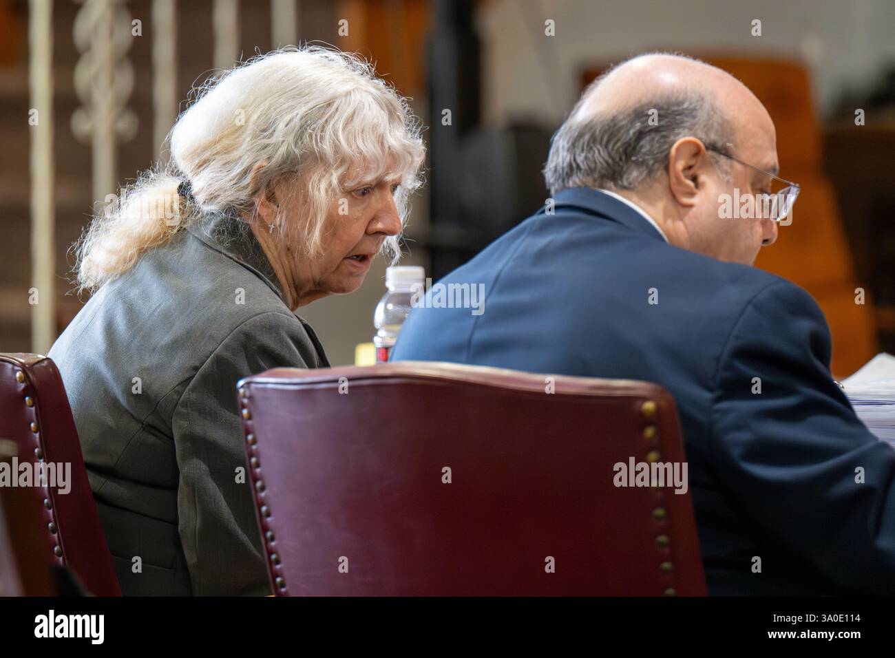 Marcella Chidester speaks to her attorney Bill Colovos as she appears ...