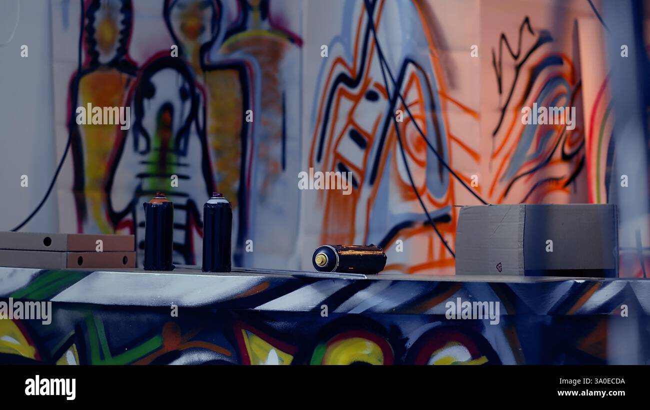 Teens paint over graffiti hi-res stock photography and images - Alamy