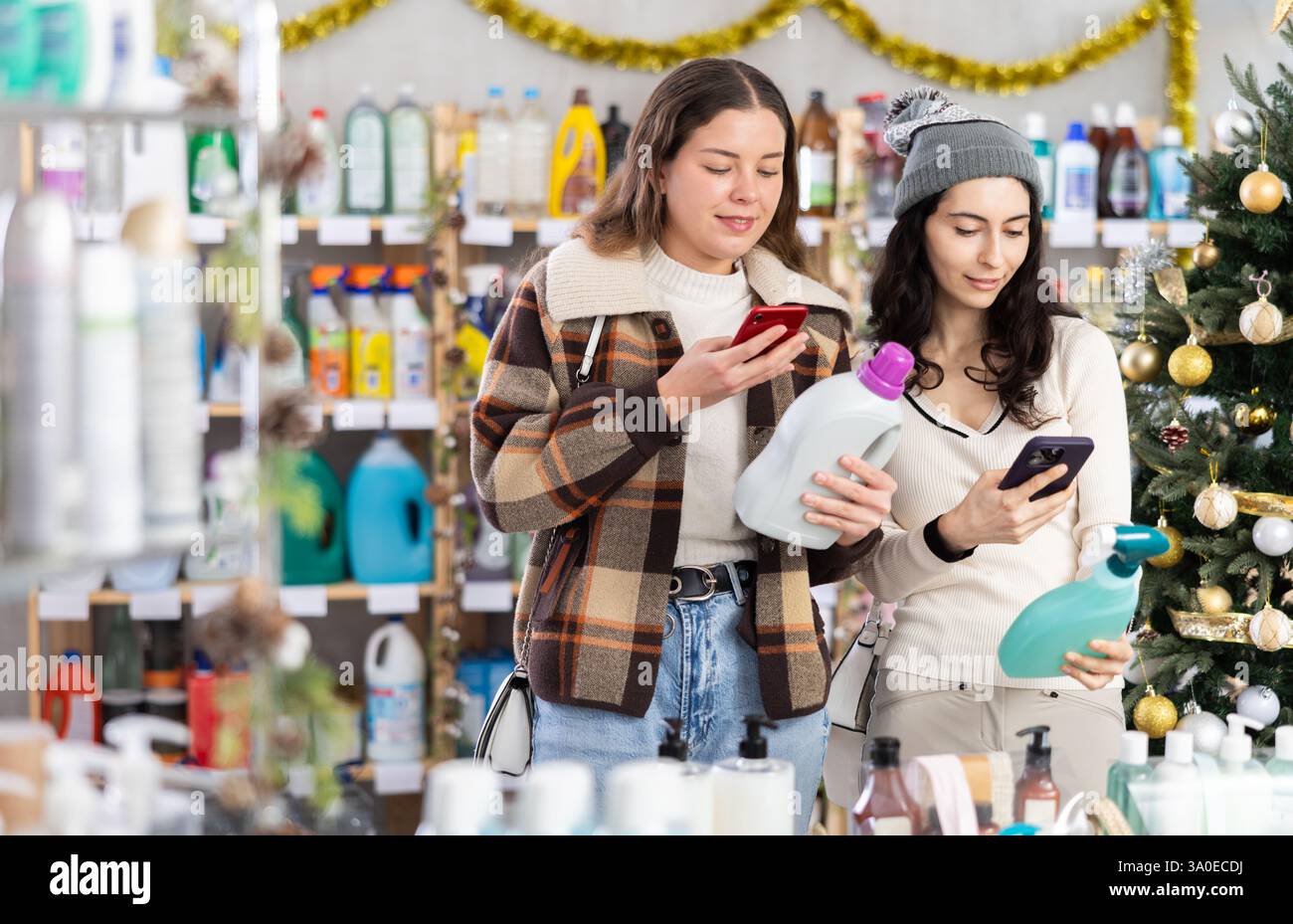 Female friends client scanning QR code on package laundry fabric ...