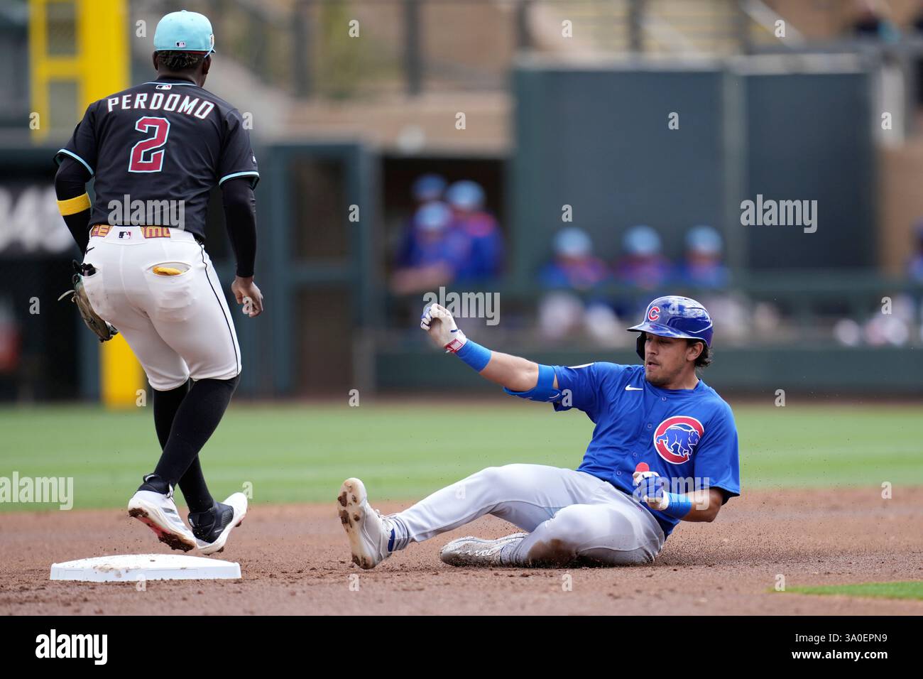 Chicago Cubs' Nicky Lopez, right, slides into second base with a double ...