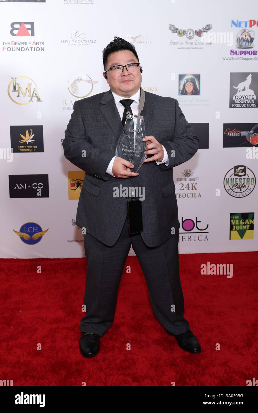 Universal City, California, USA. 2nd March 2025. Peter Wu with his ...