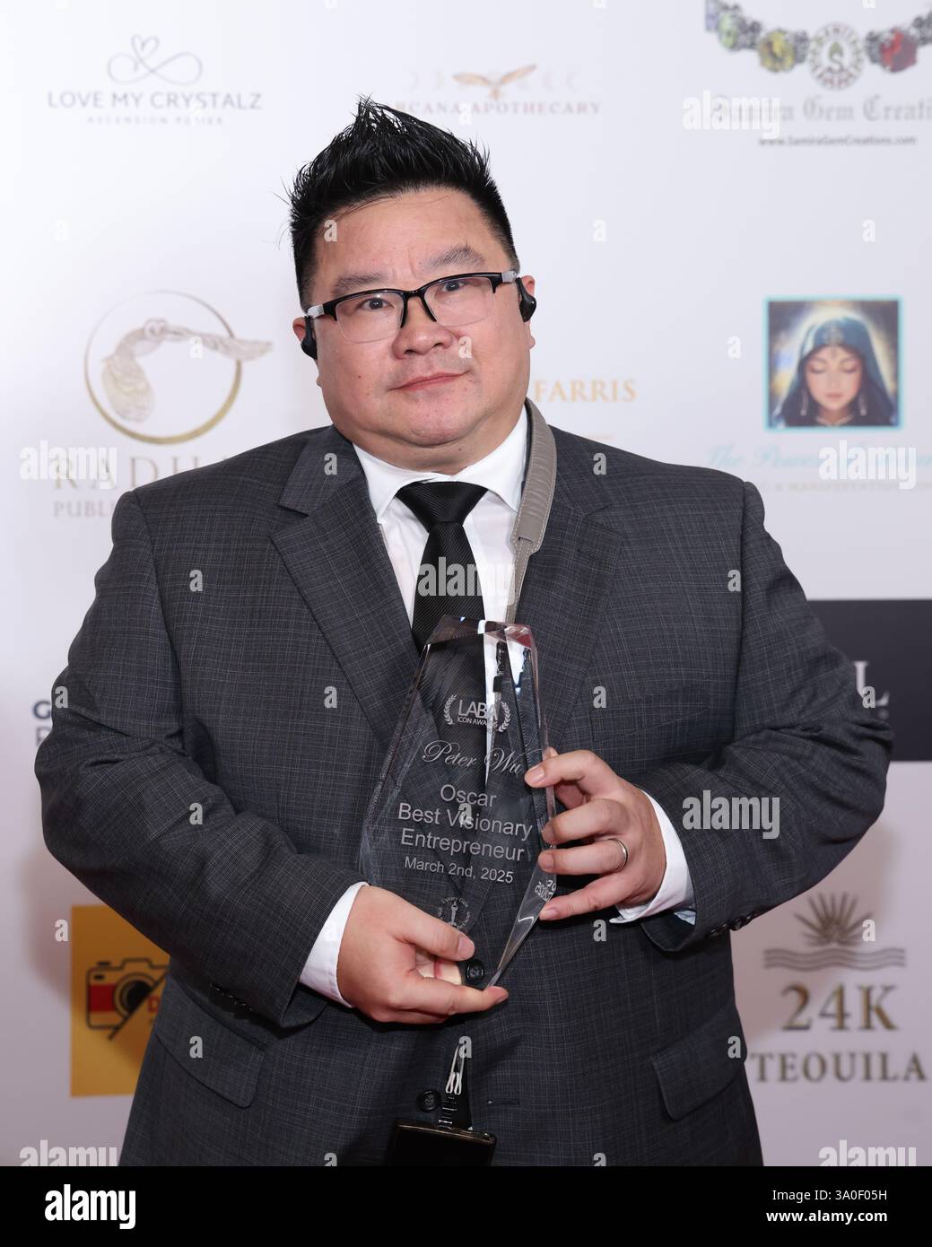 Universal City, California, USA. 2nd March 2025. Peter Wu with his ...