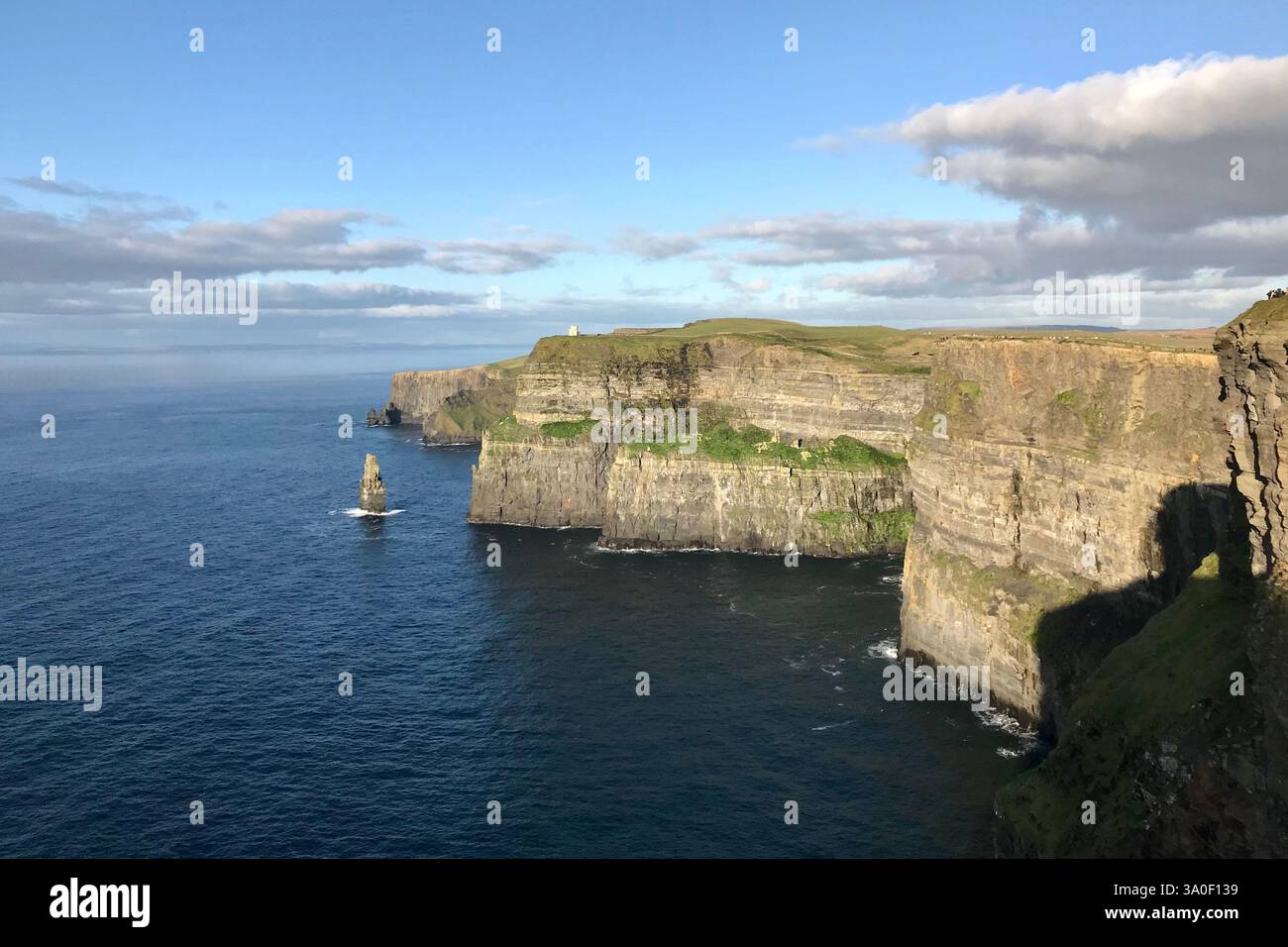 The massive, outstanding and powerful Cliffs of Moher in Ireland Stock ...