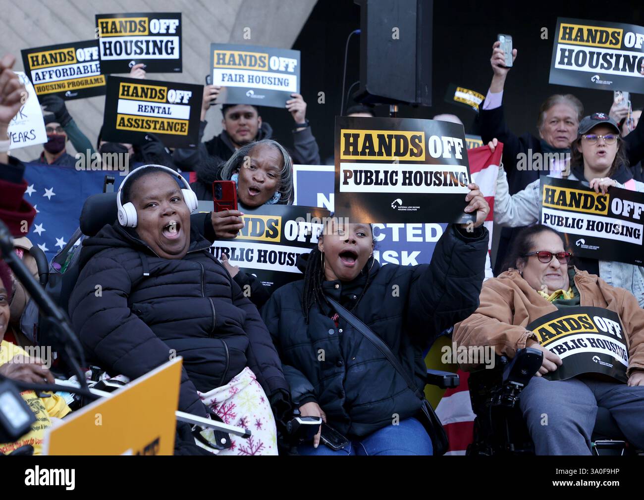 Washington Dc, Virginia, USA. 3rd Mar, 2025. Demonstrators hold ...