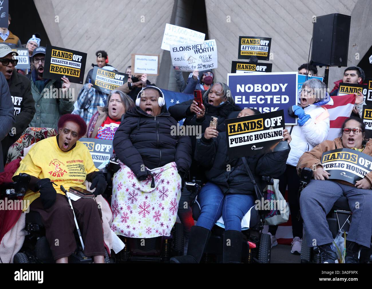 Washington Dc, Virginia, USA. 3rd Mar, 2025. Demonstrators hold ...