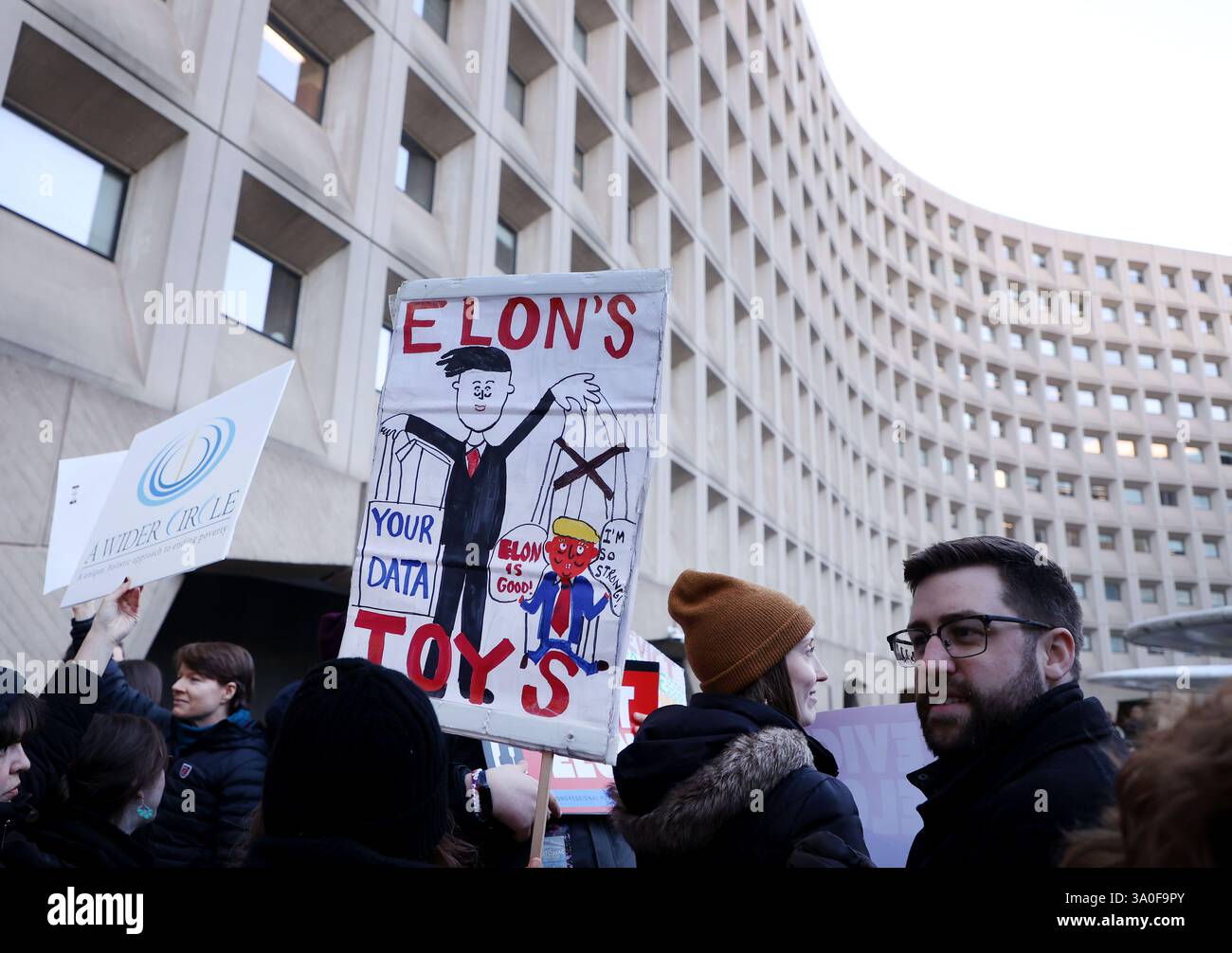 March 3, 2025, Washington Dc, Virginia, USA: Demonstrators hold ...