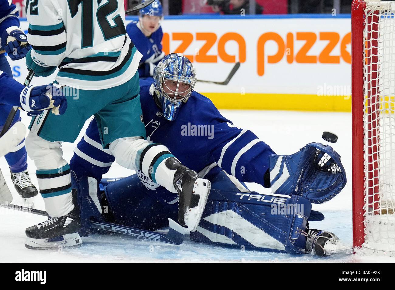 San Jose Sharks forward William Eklund (72) screens a shot saved by ...