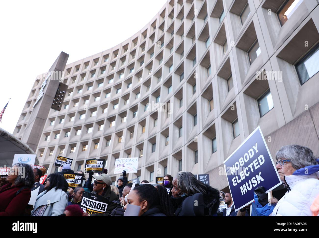 Washington Dc, Virginia, USA. 3rd Mar, 2025. Demonstrators hold ...