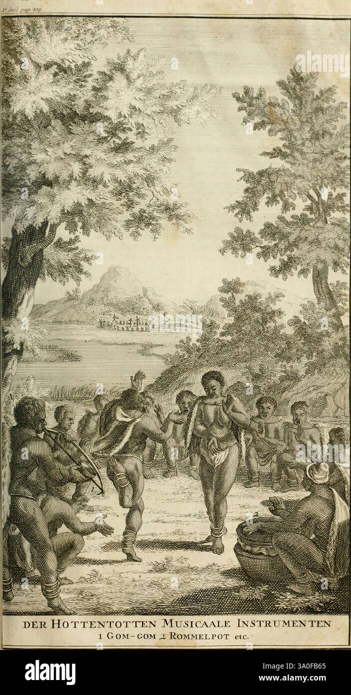 Participants in traditional attire play instruments hi-res stock ...