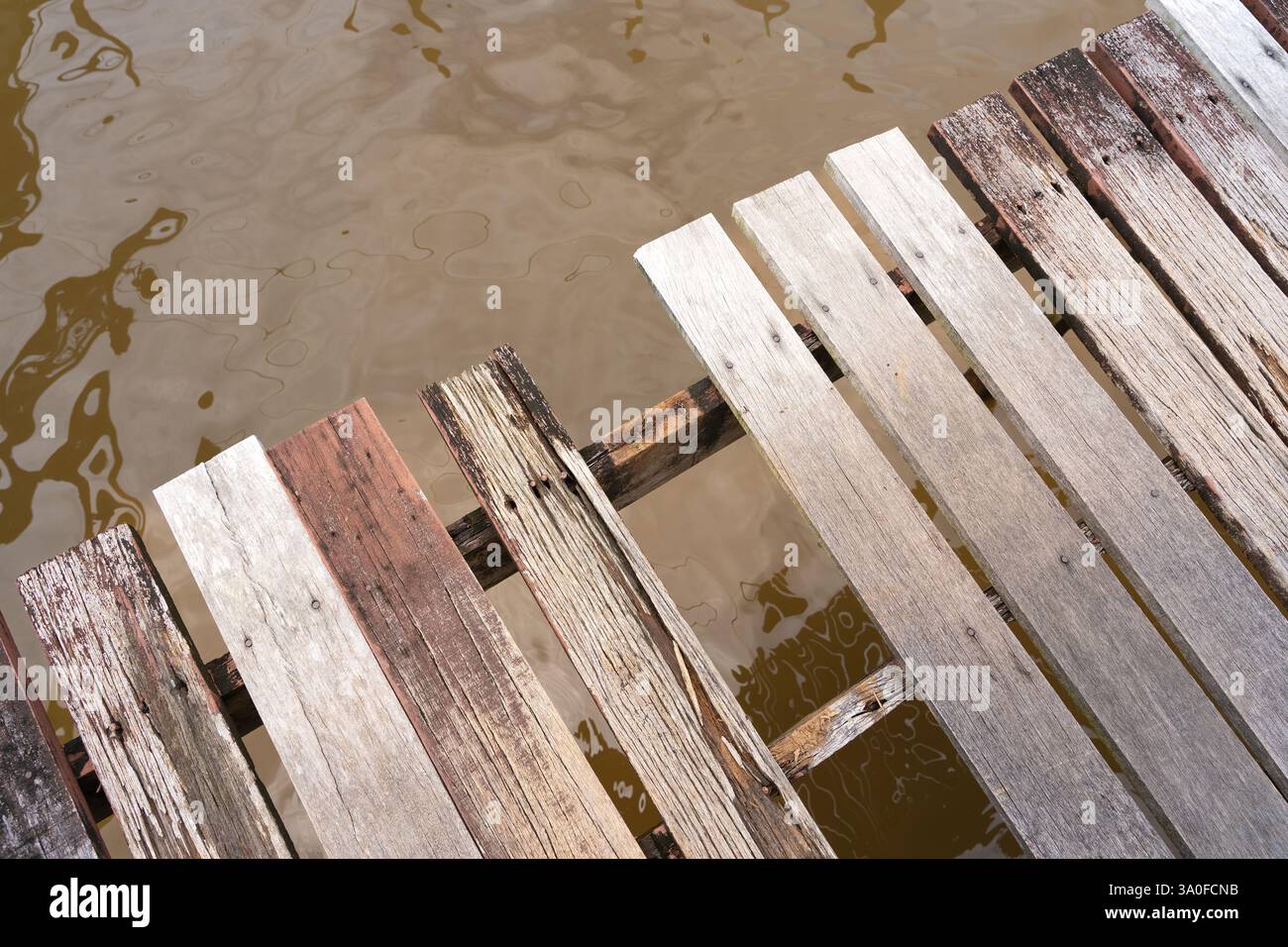 pedestrian bridge made of wood, with broken boards Stock Photo - Alamy