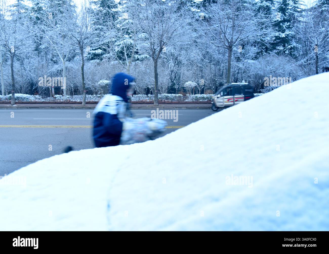 ZAOZHUANG, CHINA - MARCH 4, 2025 - People travel after snow on Beijing ...