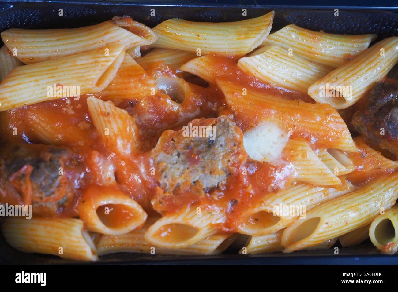 Delicious pasta with meatballs and marinara sauce on display Stock ...