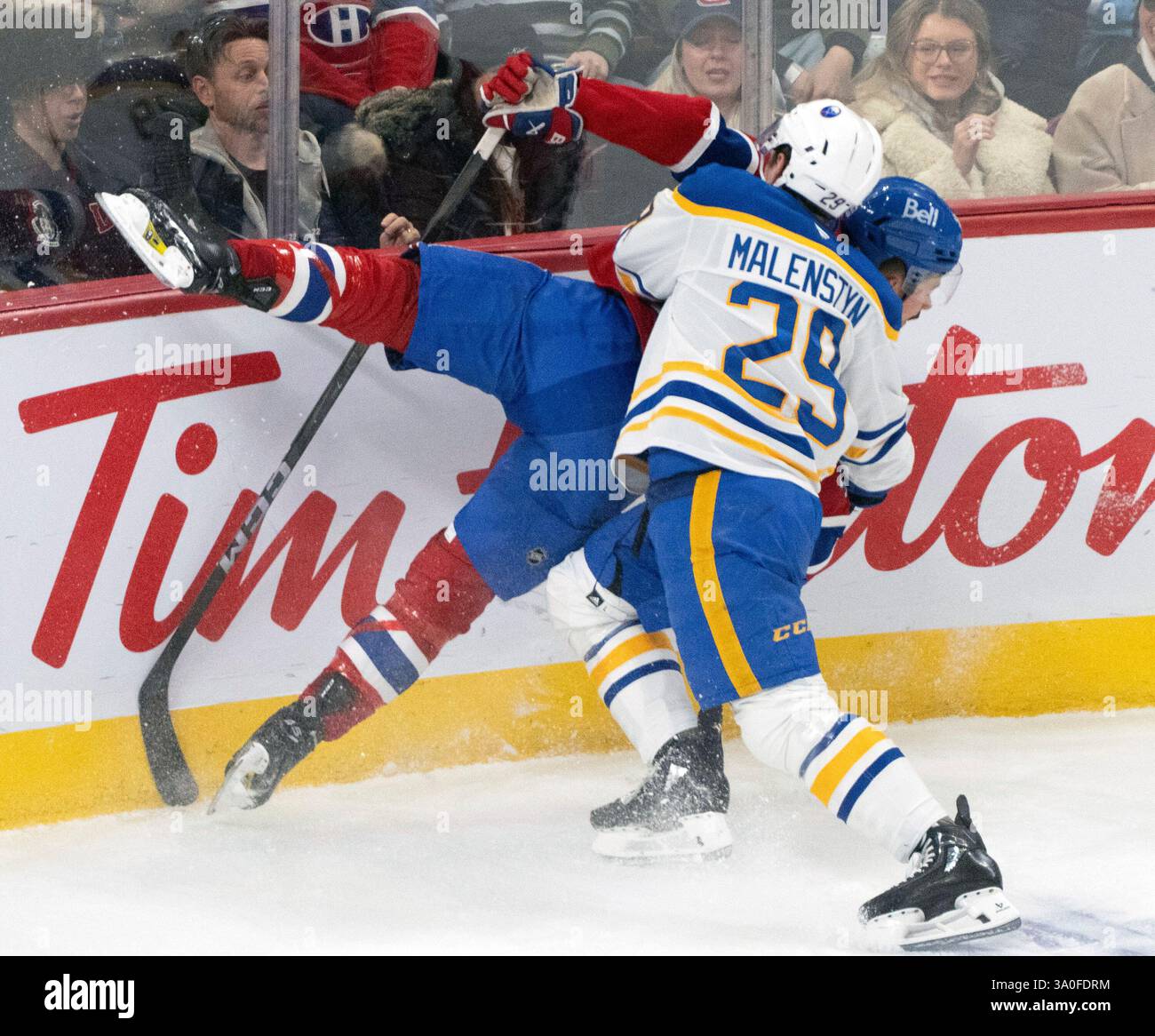 Buffalo Sabres' Beck Malenstyn (29) checks Montreal Canadiens ...