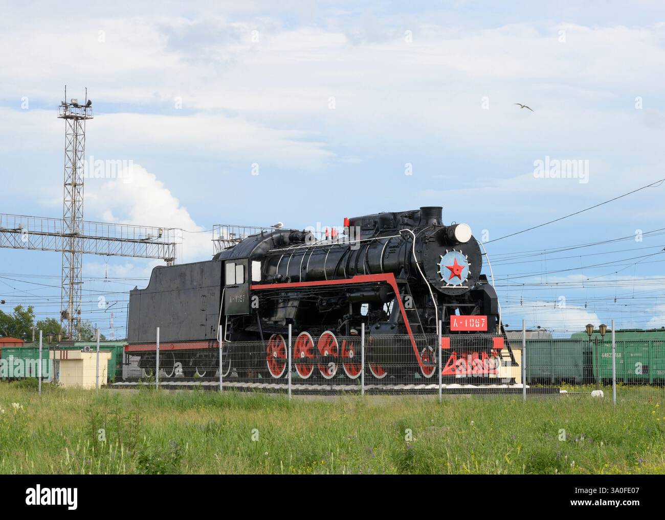 Retro steam locomotive of the mid-20th century at the railway station ...