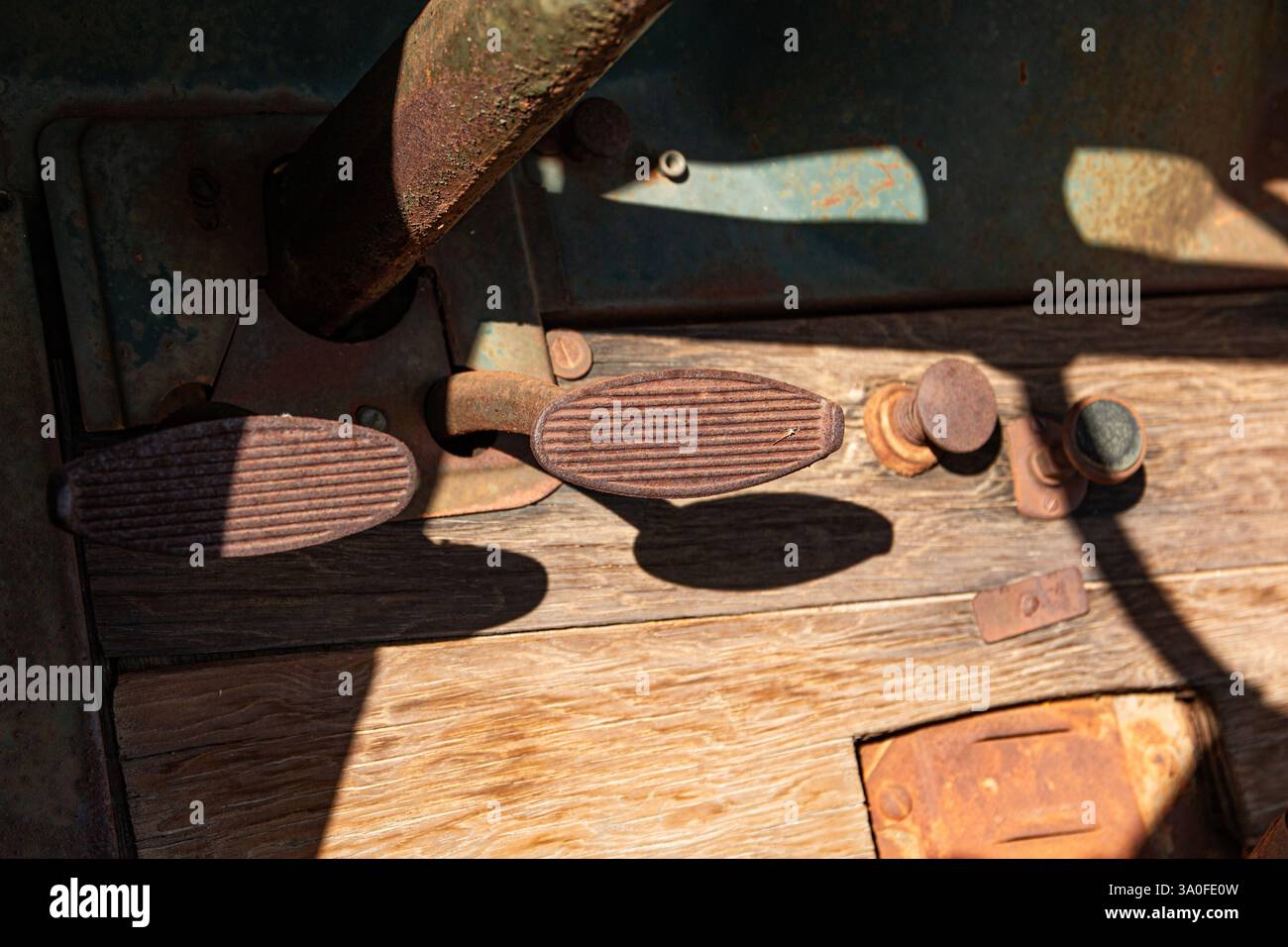 Foot pedals and controls on the floorboard of an antique Model T style ...