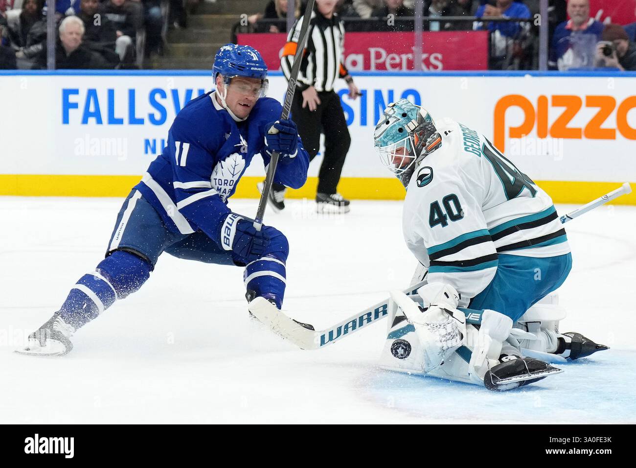 San Jose Sharks goaltender Alexandar Georgiev (40) makes a save on ...