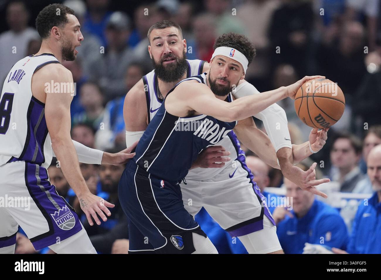 Dallas Mavericks guard Klay Thompson looks to make a pass as Sacramento ...