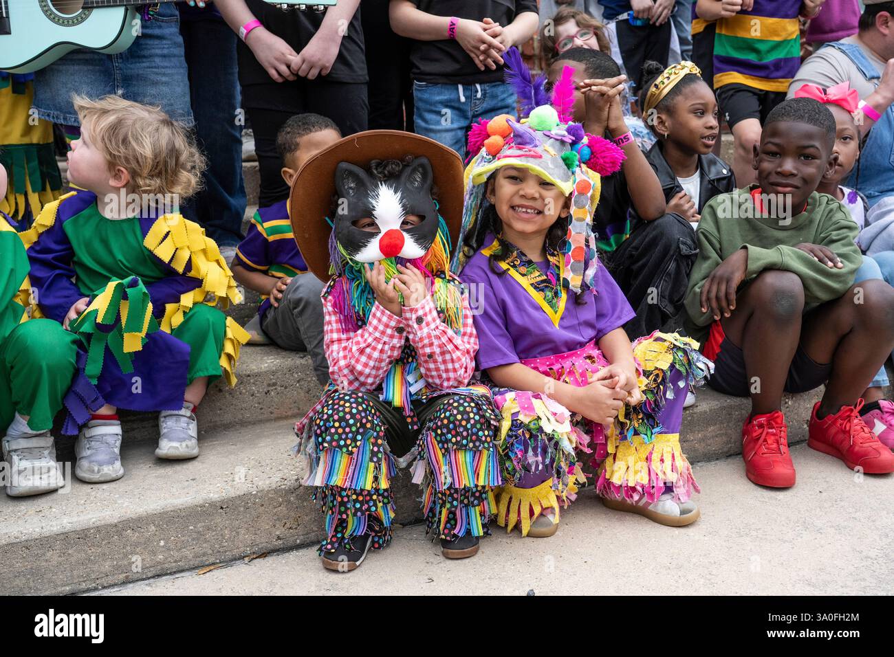 Children pose during The Teche Center for the Arts Courir des Enfants ...