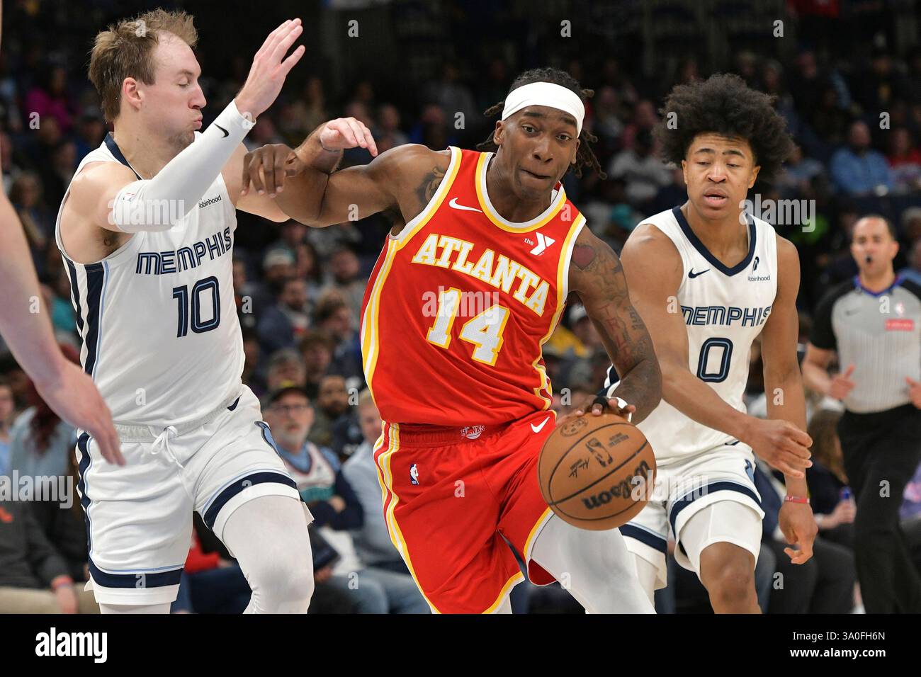 Atlanta Hawks guard Terance Mann (14) handles the ball between Memphis ...