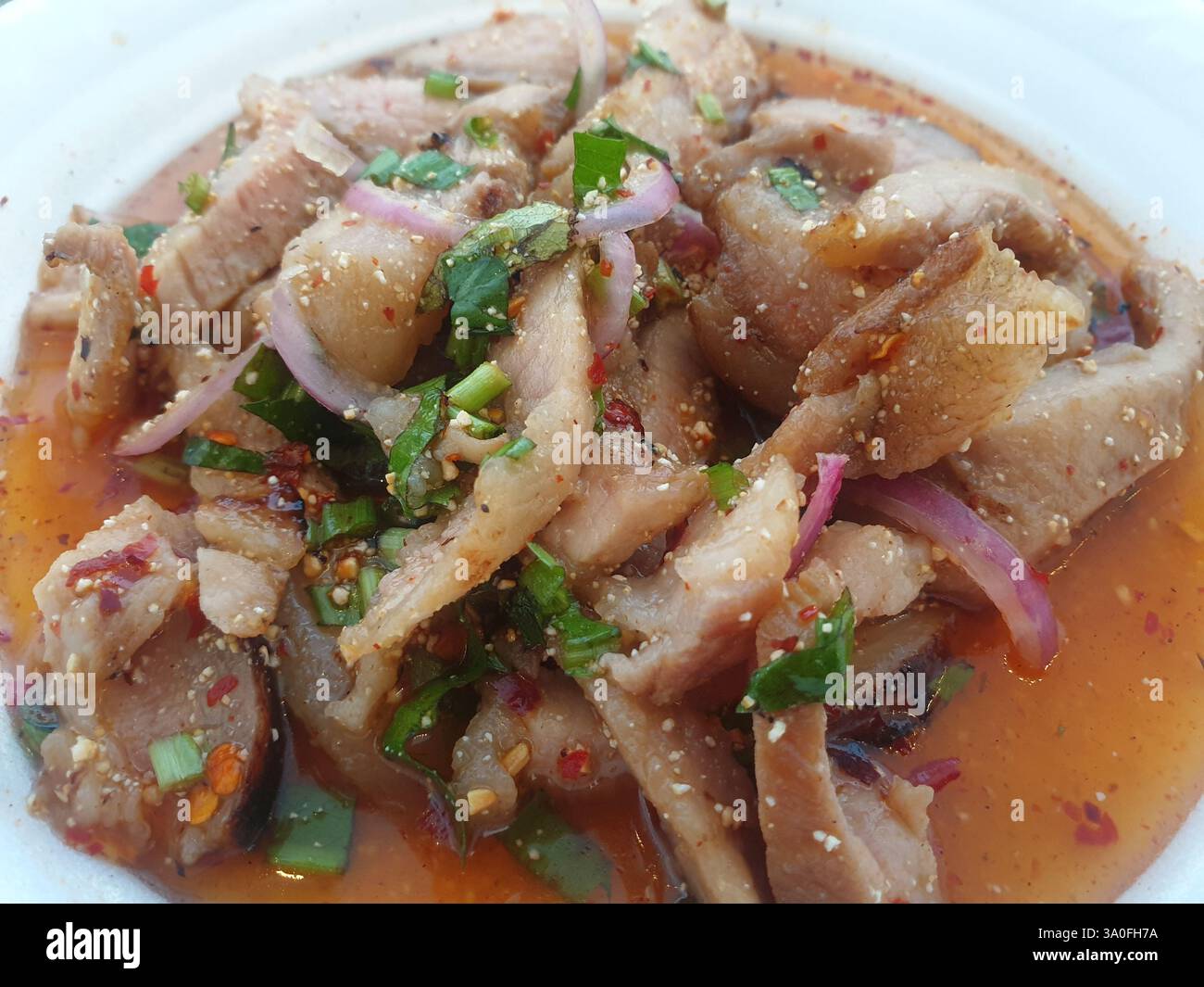 Spicy minced pork salad or Ground pork salad (Laab) is a Thai food for ...