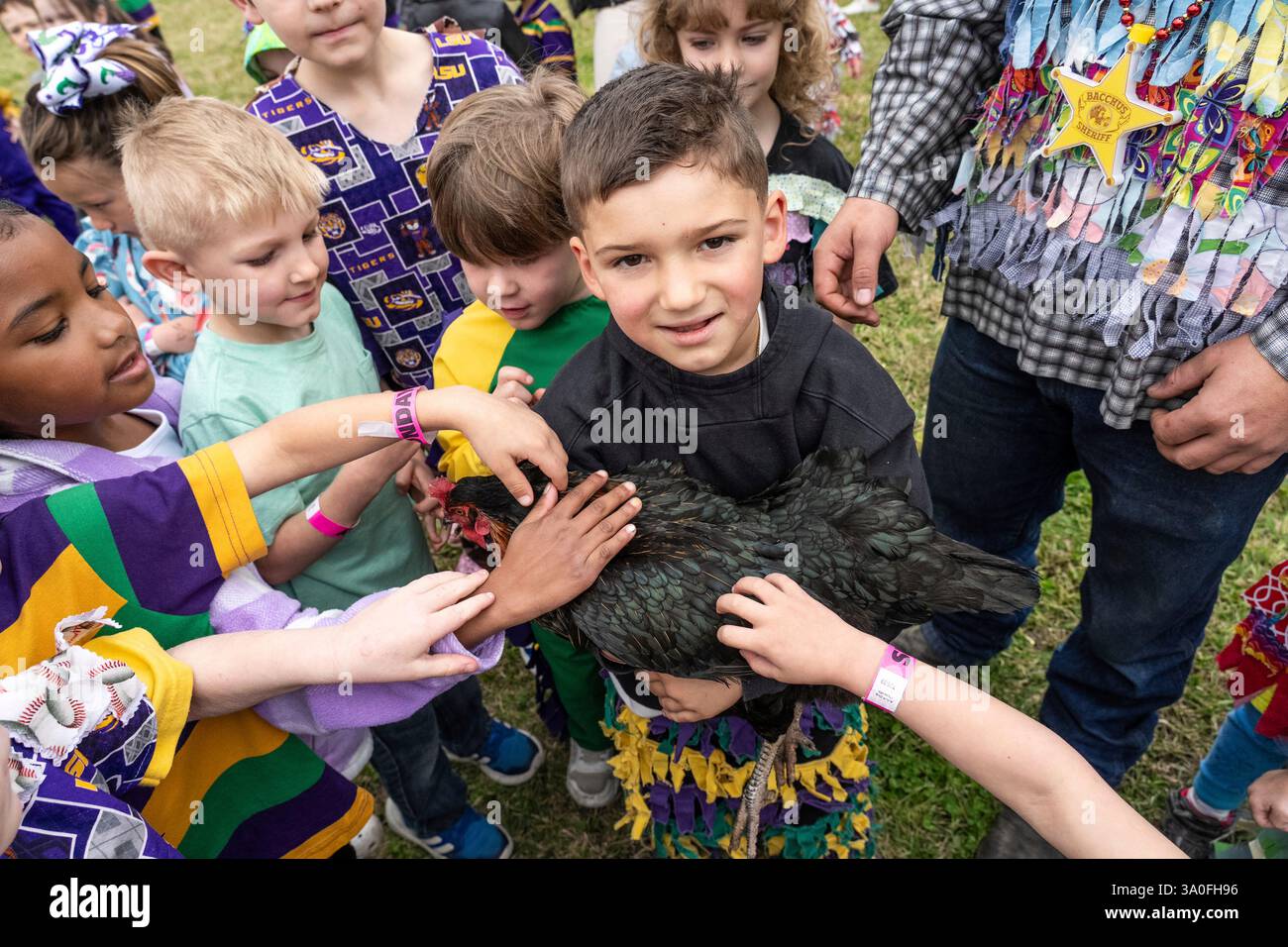 Children pose during The Teche Center for the Arts Courir des Enfants ...