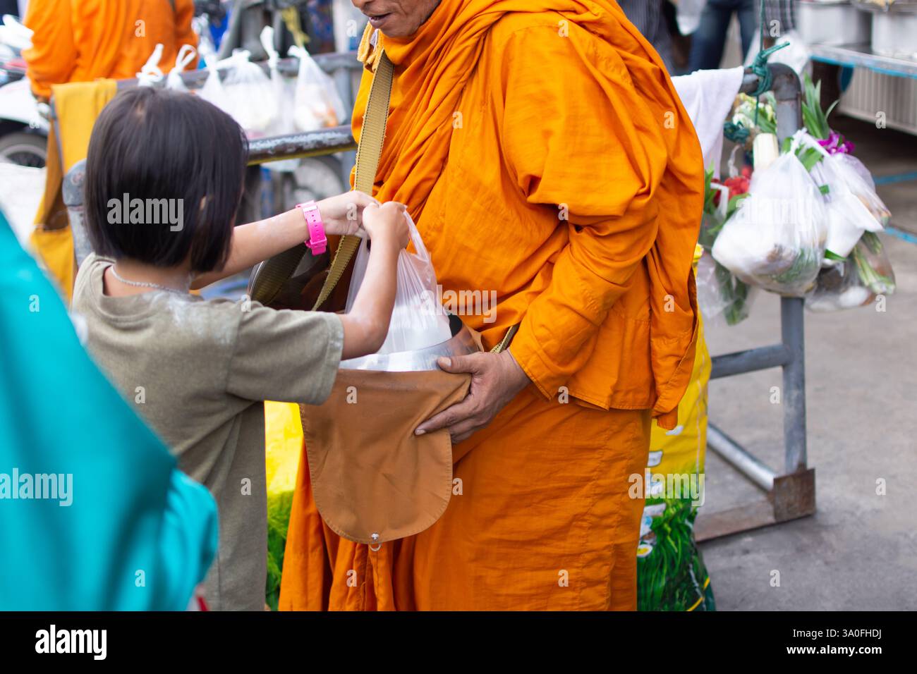 Thai monk ask for alms in morning for buddhist to make merit to offer ...