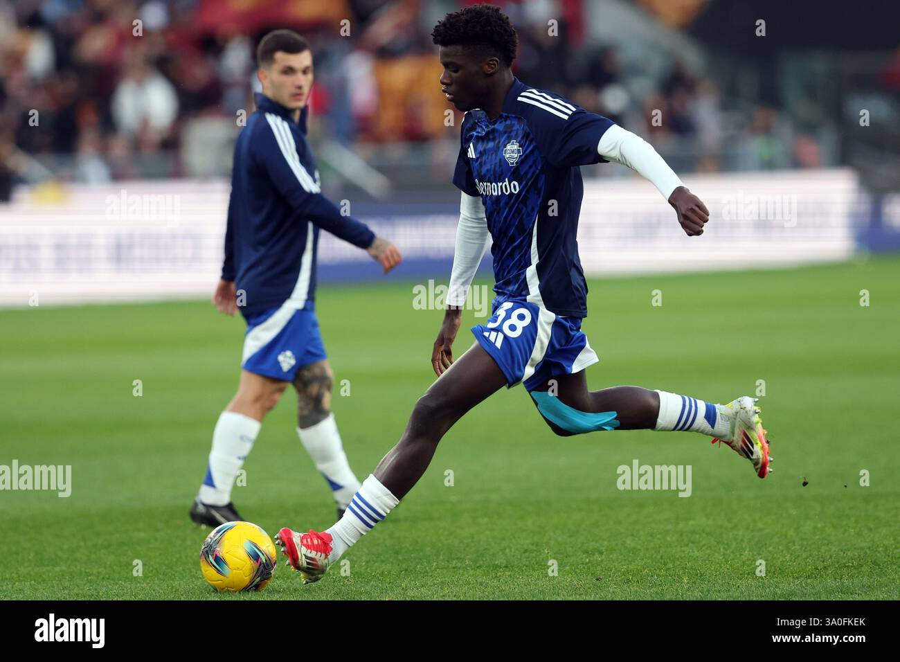 Rome, Italy. 02nd Mar, 2025. Assane Diao of Como seen in action during warm-up before the ...