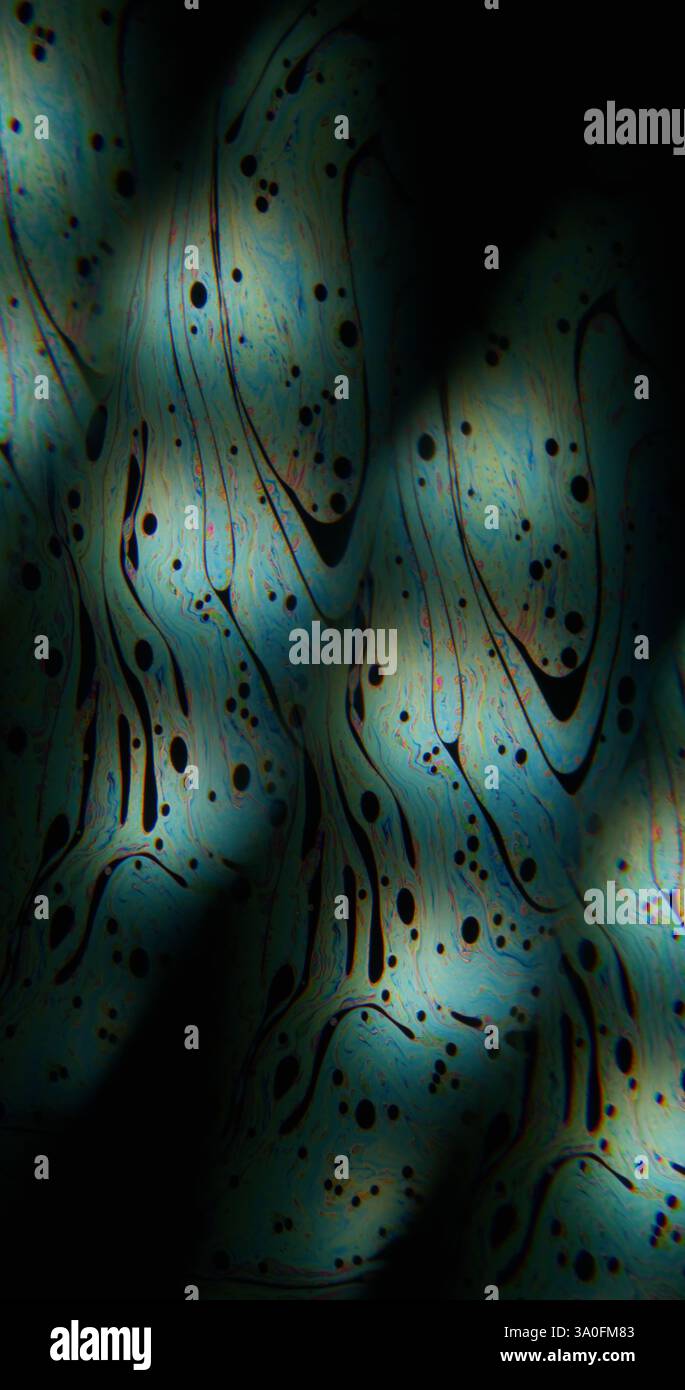 Gasoline fluid. Kaleidoscope oil. Color duplicated light prism spot on ...