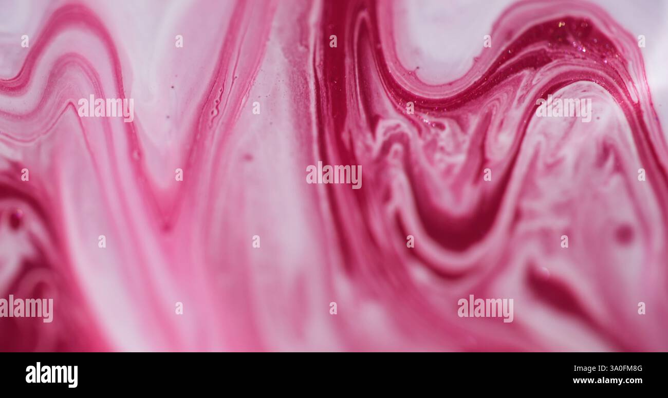 Ripple paint. Shiny fluid. Defocused red pink white colorful marble ...