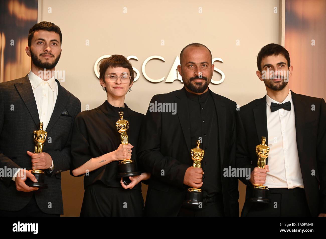 Hollywood, Ca. 2nd Mar, 2025. Basel Adra, Rachel Szor, Hamdan Ballal ...