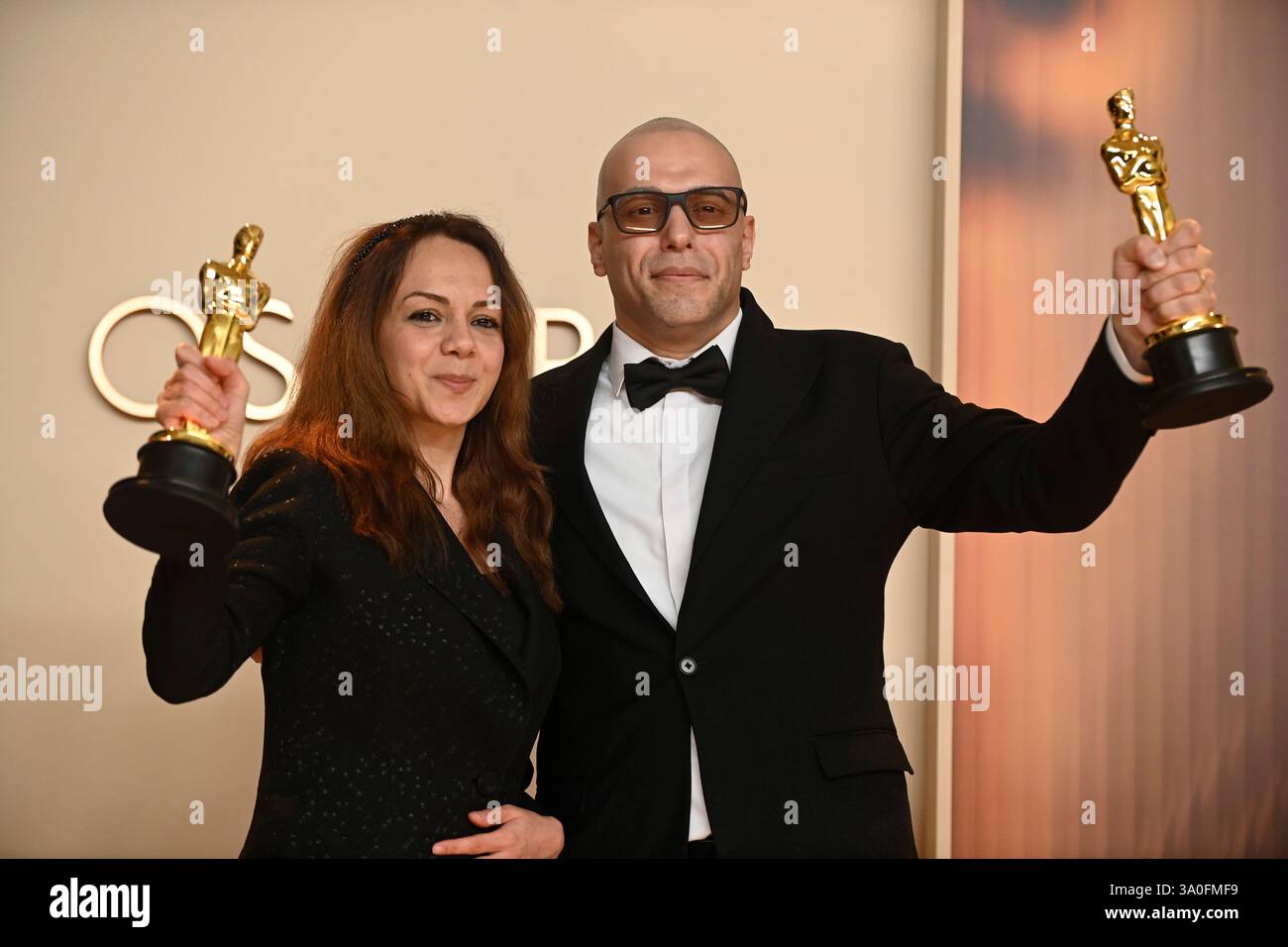 Hollywood, Ca. 2nd Mar, 2025. Shirin Sohani and Hossein Molayemi in the press room at the 97th ...