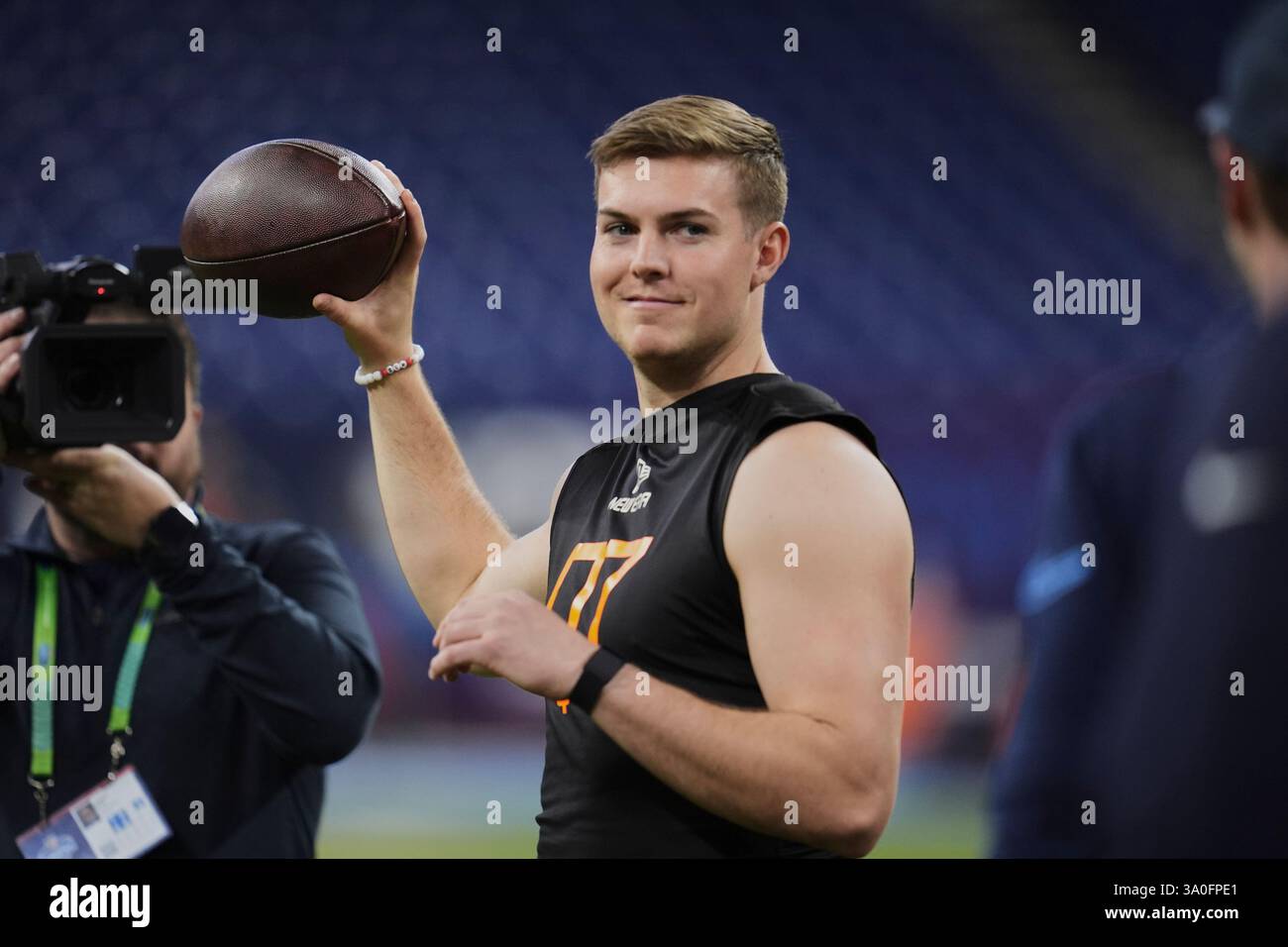 Ohio State quarterback Will Howard runs a drill at the NFL football ...