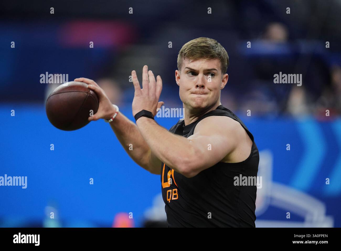 Ohio State quarterback Will Howard runs a drill at the NFL football ...