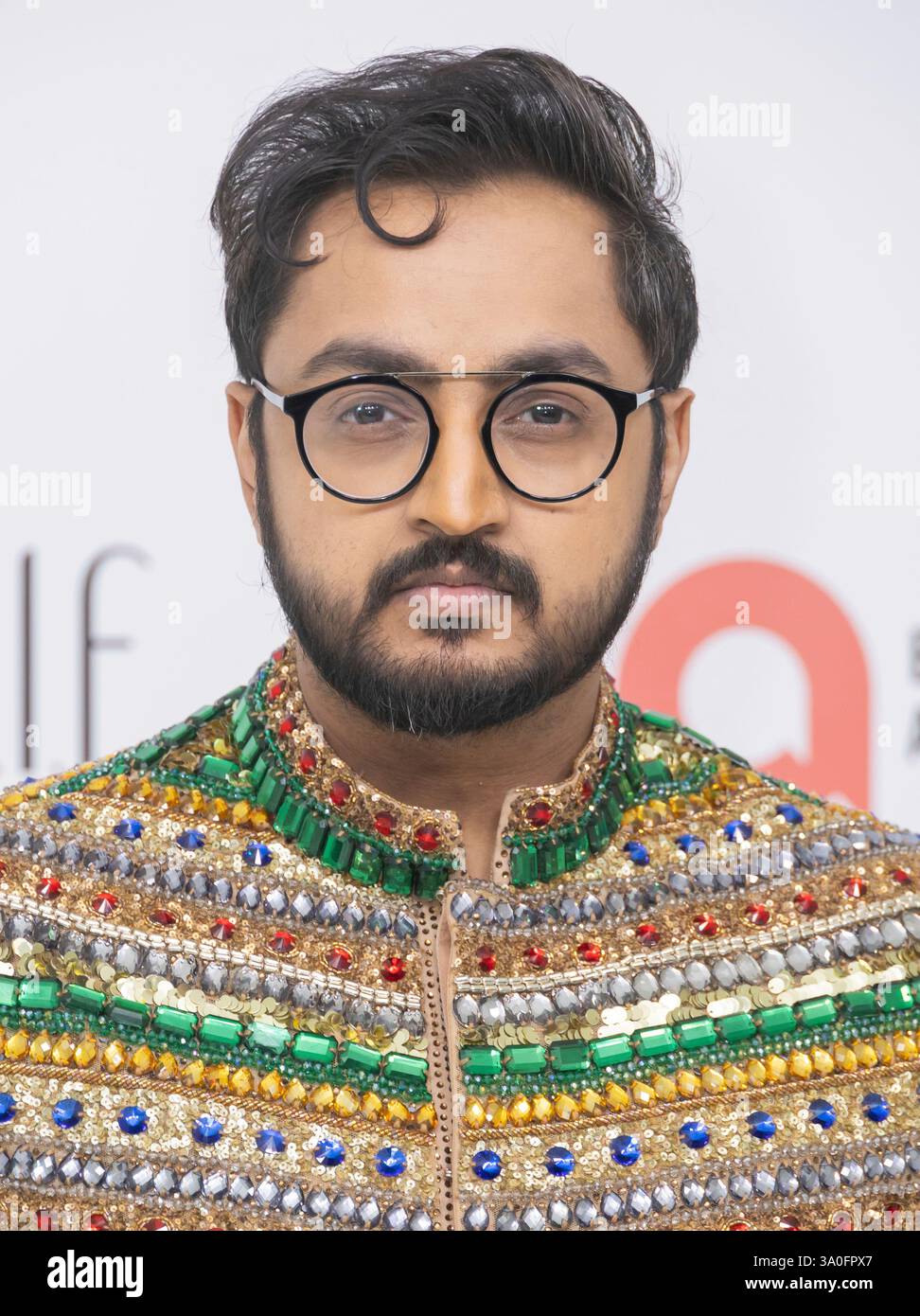 Anip Patel arrives at the 33rd Annual Elton John AIDS Foundation ...