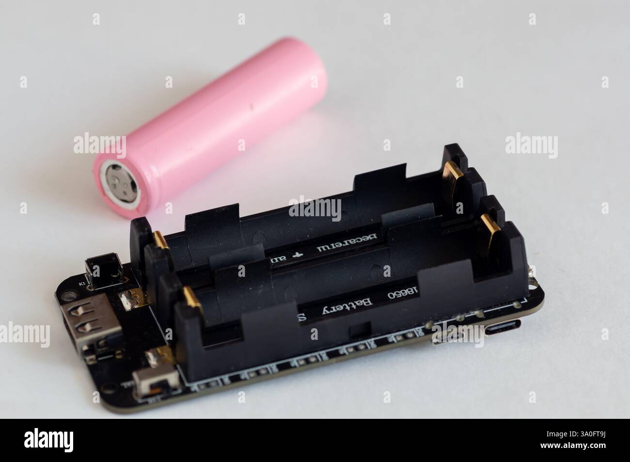Charging and monitoring device for 18650 batteries Stock Photo - Alamy