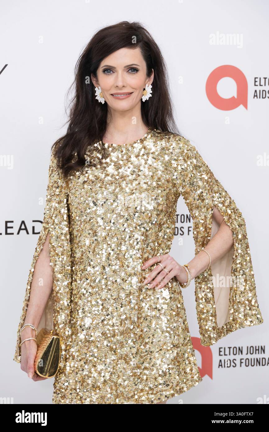 Elizabeth Tulloch arrives at the 33rd Annual Elton John AIDS Foundation ...