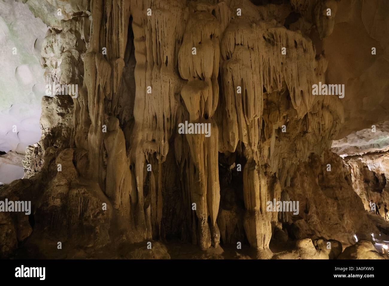 Caves on Islands in Ha Long Bay Stock Photo - Alamy