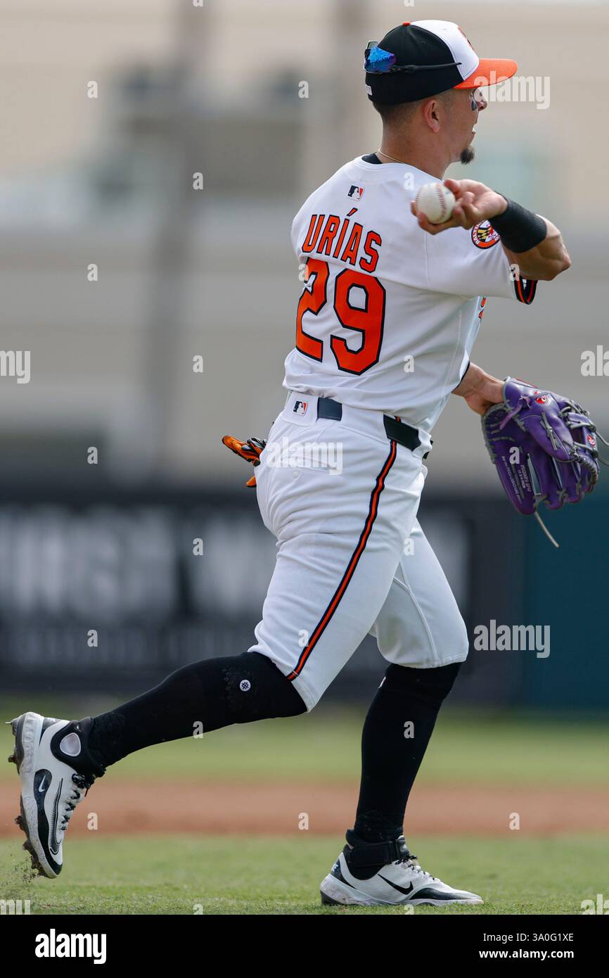 Sarasota FL USA; Baltimore Orioles third base Ramón Urías (29) throws ...