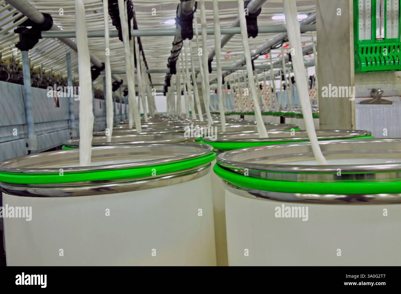 Cotton group in spinning production line factory Stock Photo - Alamy