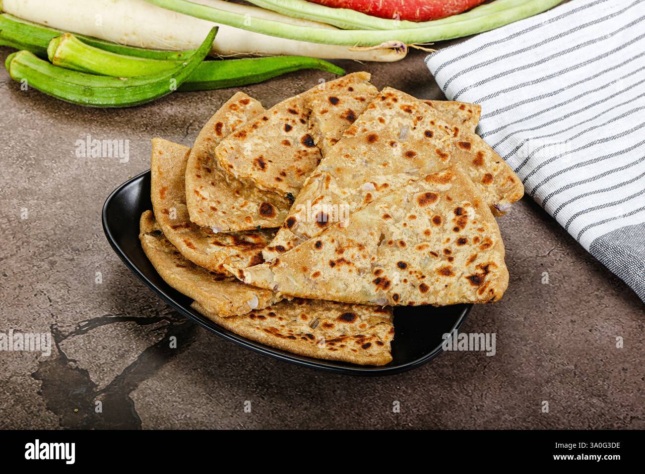 Indian vegetarian Aloo Paratha - bread with potato Stock Photo - Alamy
