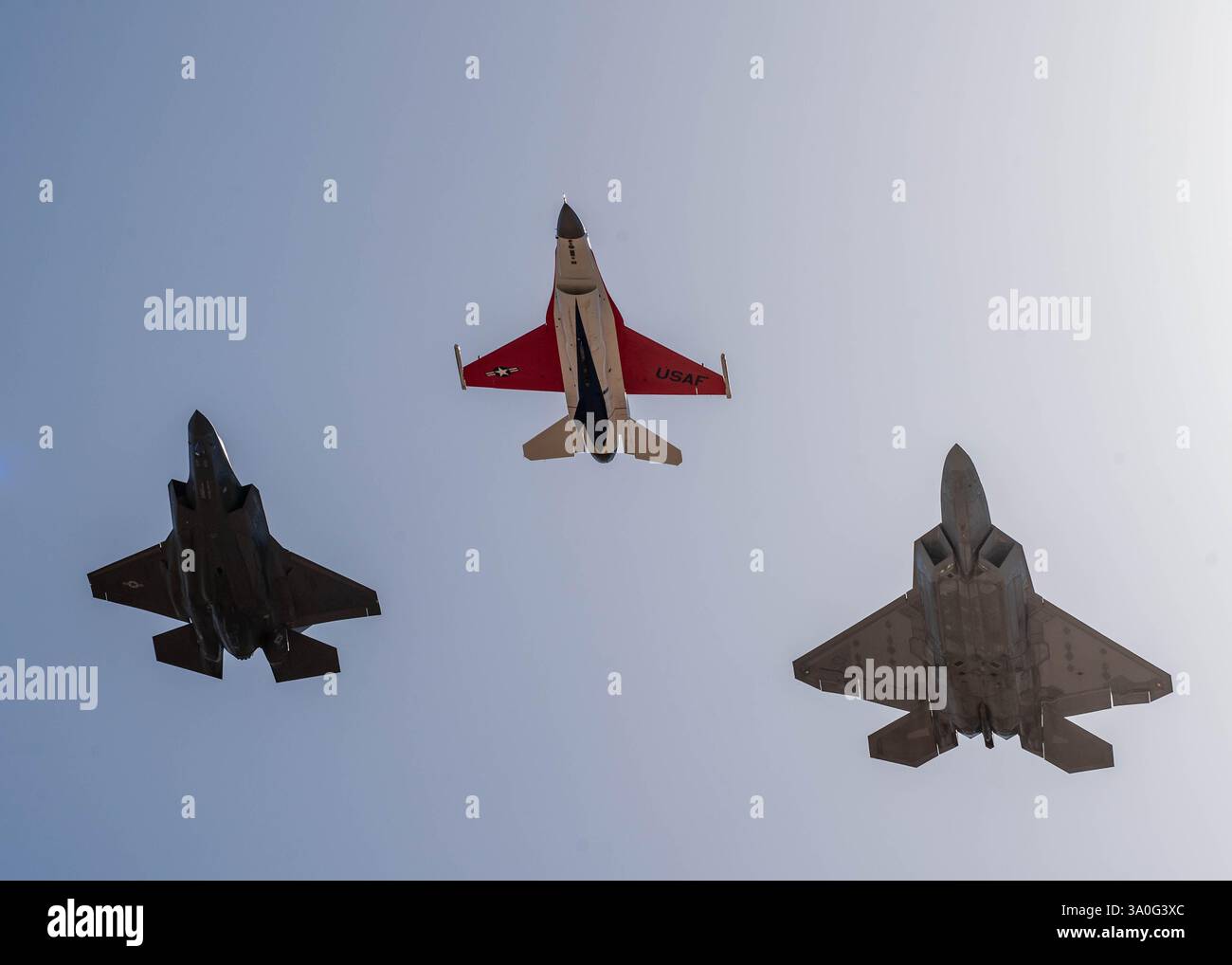 A U.S. Air Force F-16 Fighting Falcon aircraft flies in formation with ...