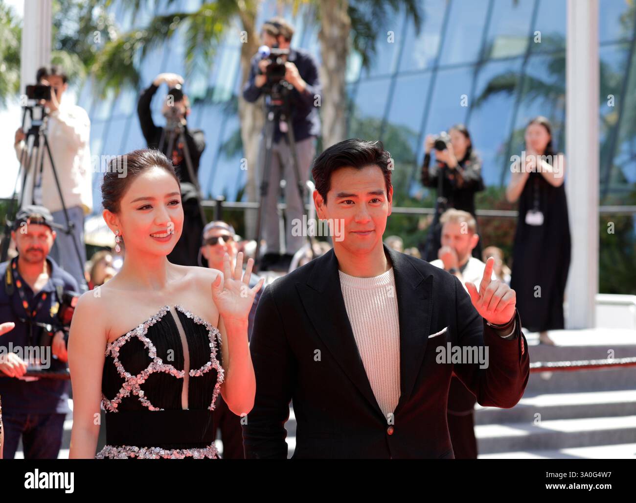 Chinese actors Tong Liya and Eddie Peng at the Cannes Film Festival 2024 with her Film Black Dog ...